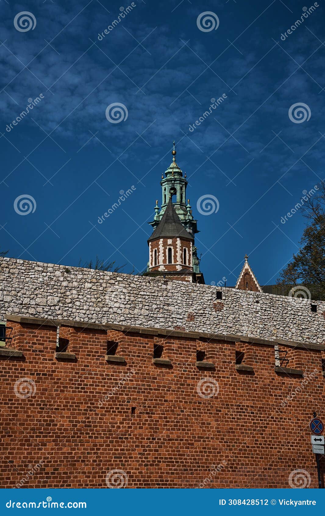 Castle Towers Behind the Red Brick Wall in Krakow Stock Photo - Image ...
