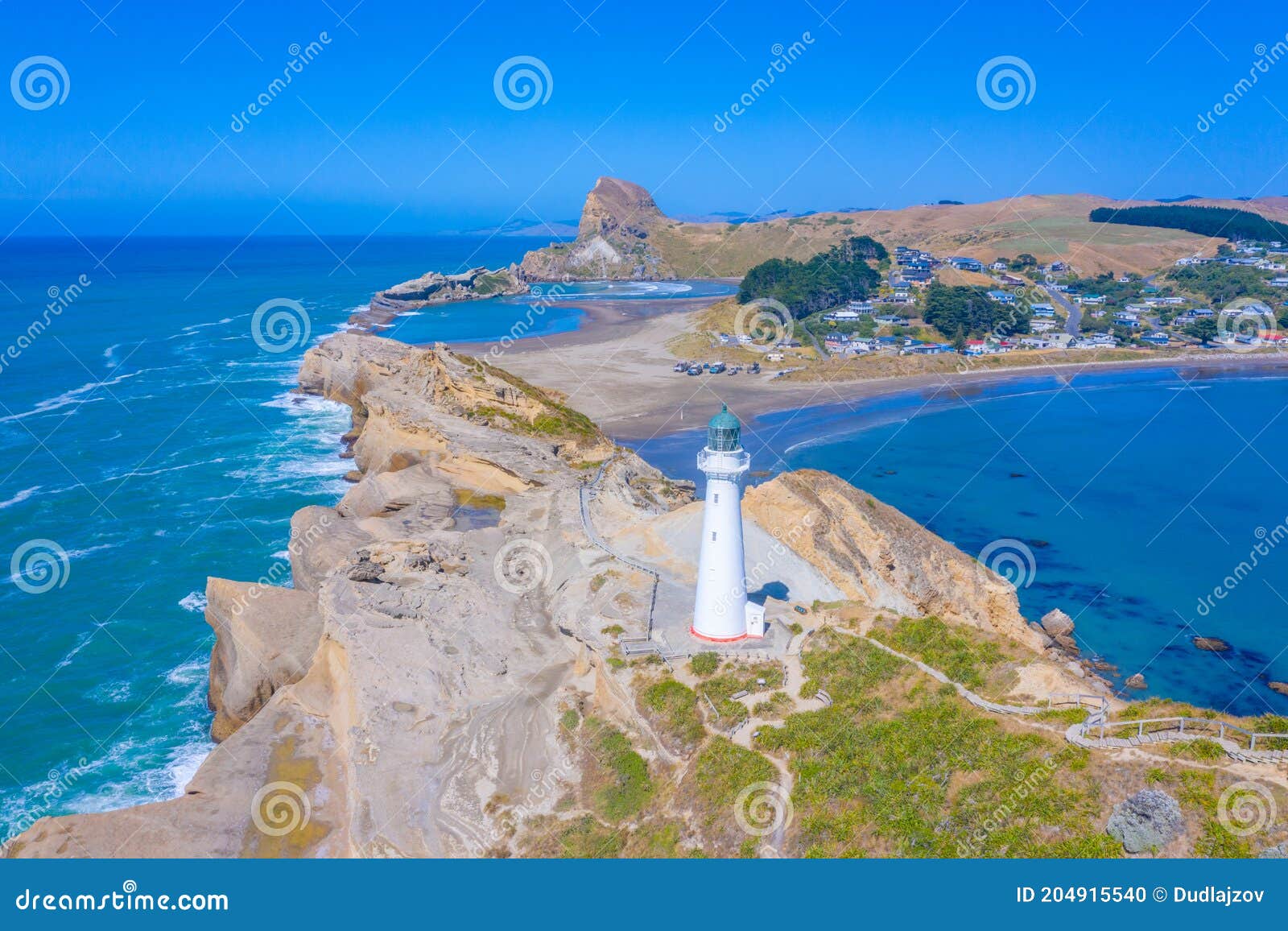 Castlepoint Lighthouse in New Zealand Stock Photo - Image of coast ...