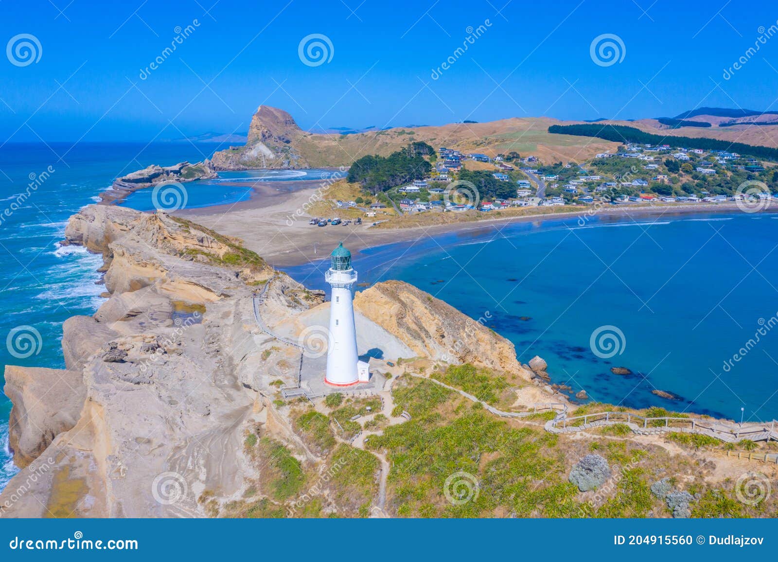 Castlepoint Lighthouse in New Zealand Stock Photo - Image of shore ...