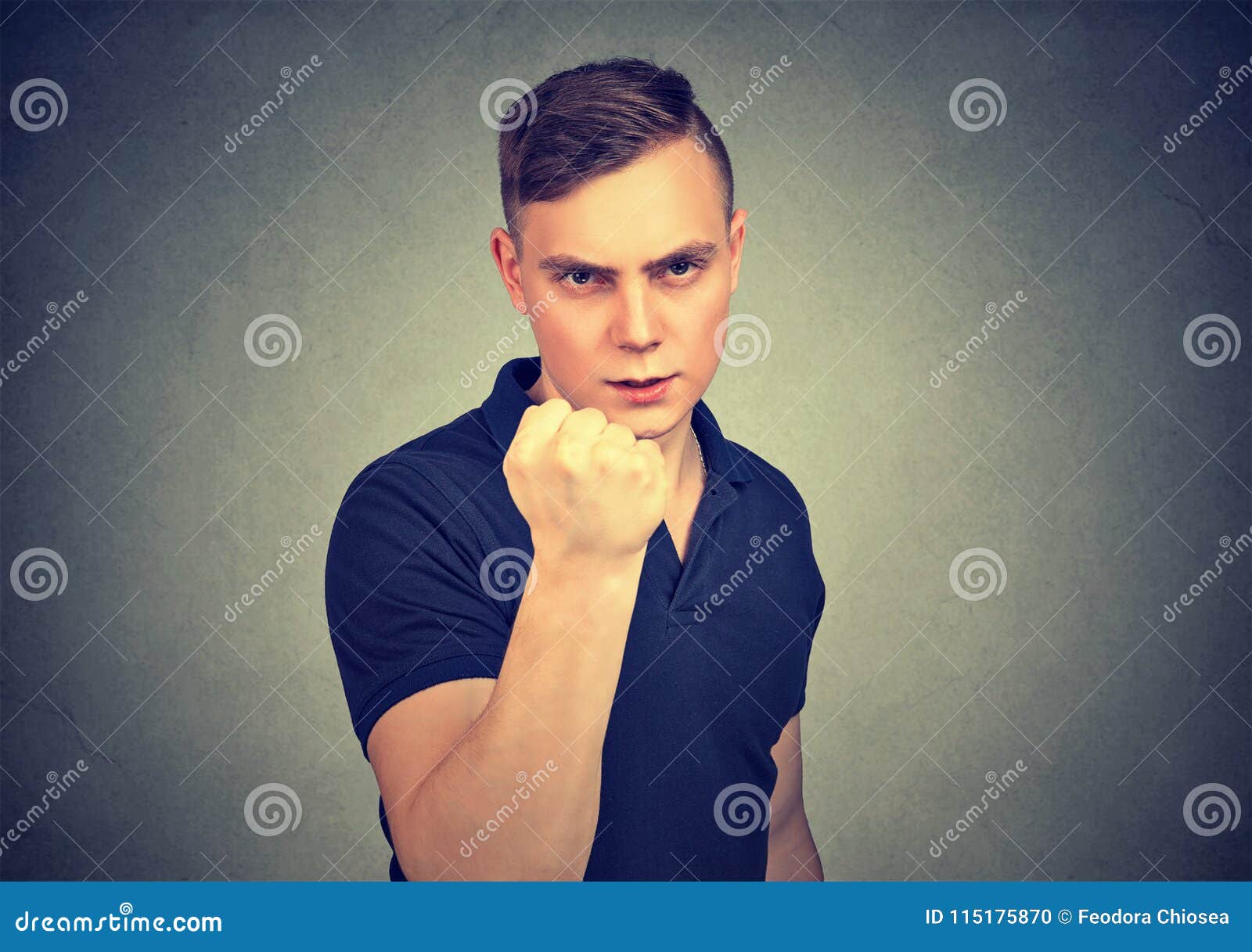 Aggressive Young Man Threatening with Fist Hand Stock Photo - Image of ...