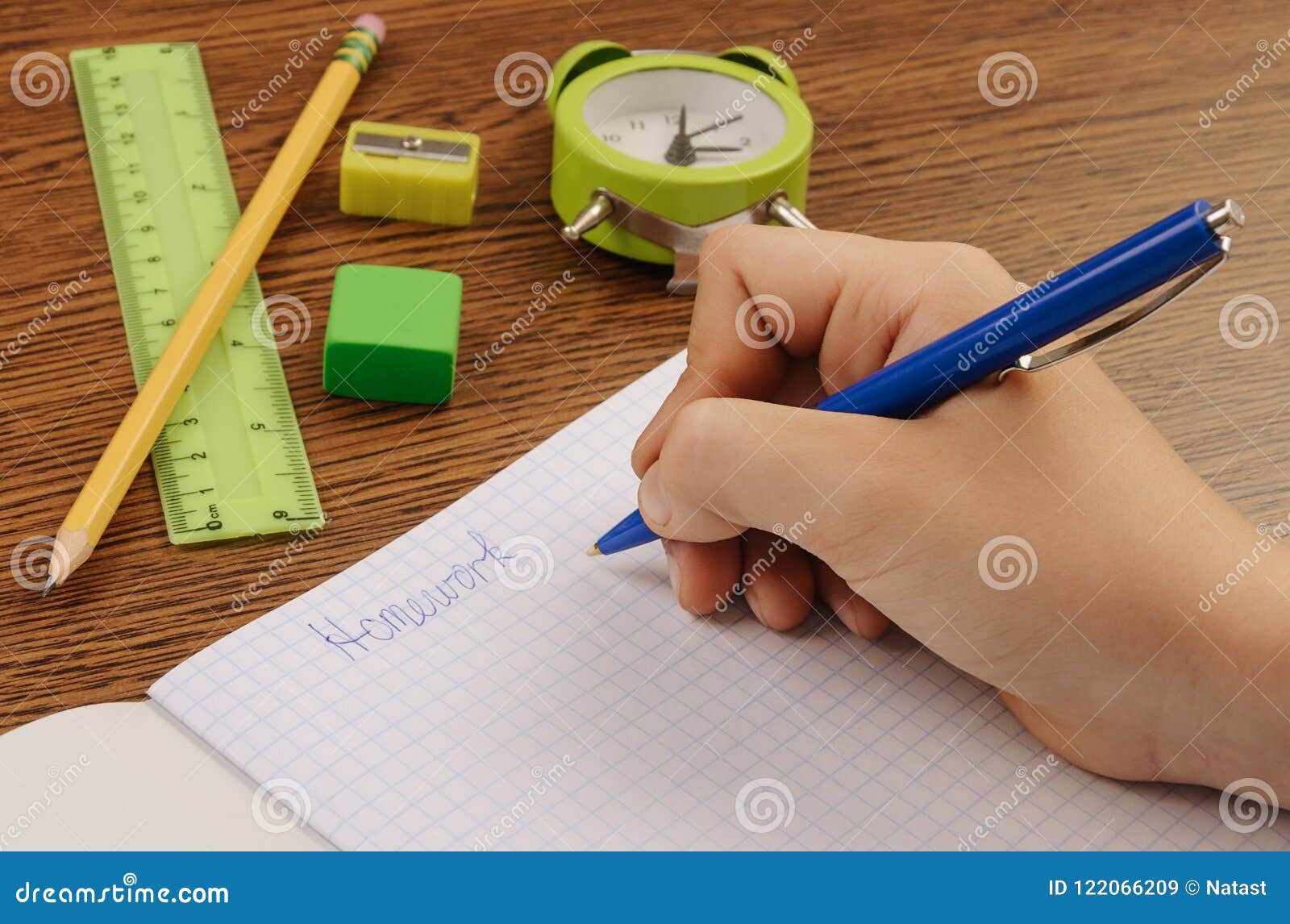 Casual Boy Doing His Homework in Notepad. Stock Image - Image of ...