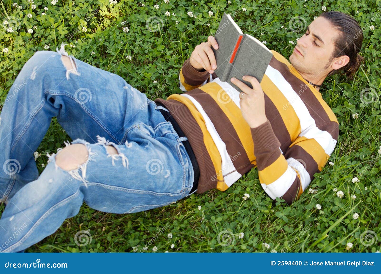 Casual boy reading stock photo. Image of fiction, recreation - 2598400
