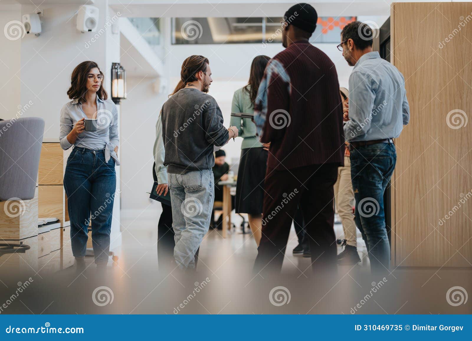 Casual Business Colleagues Networking and Sharing Ideas in a Modern ...