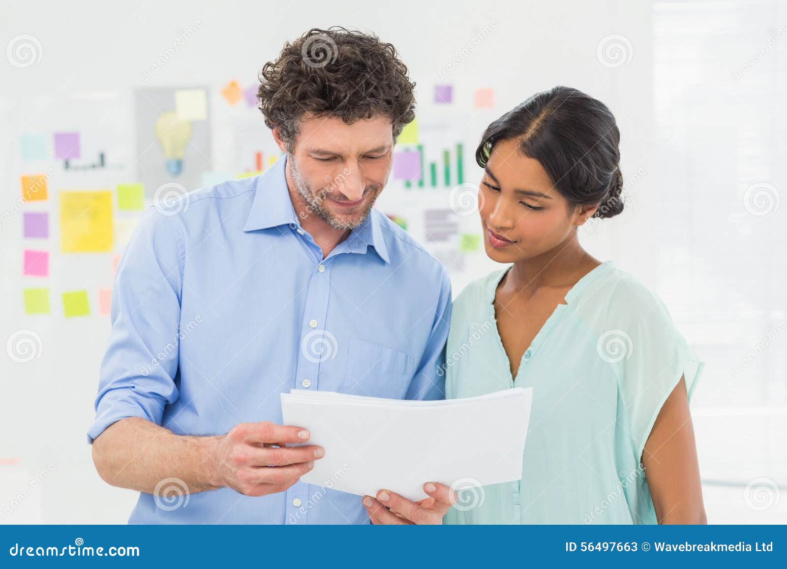 Casual Business Partners Looking at Files Stock Image - Image of ...