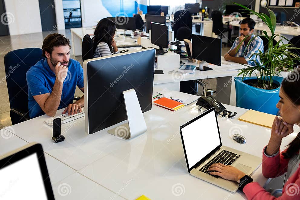 Casual Business People Using Technology Stock Photo - Image of ...