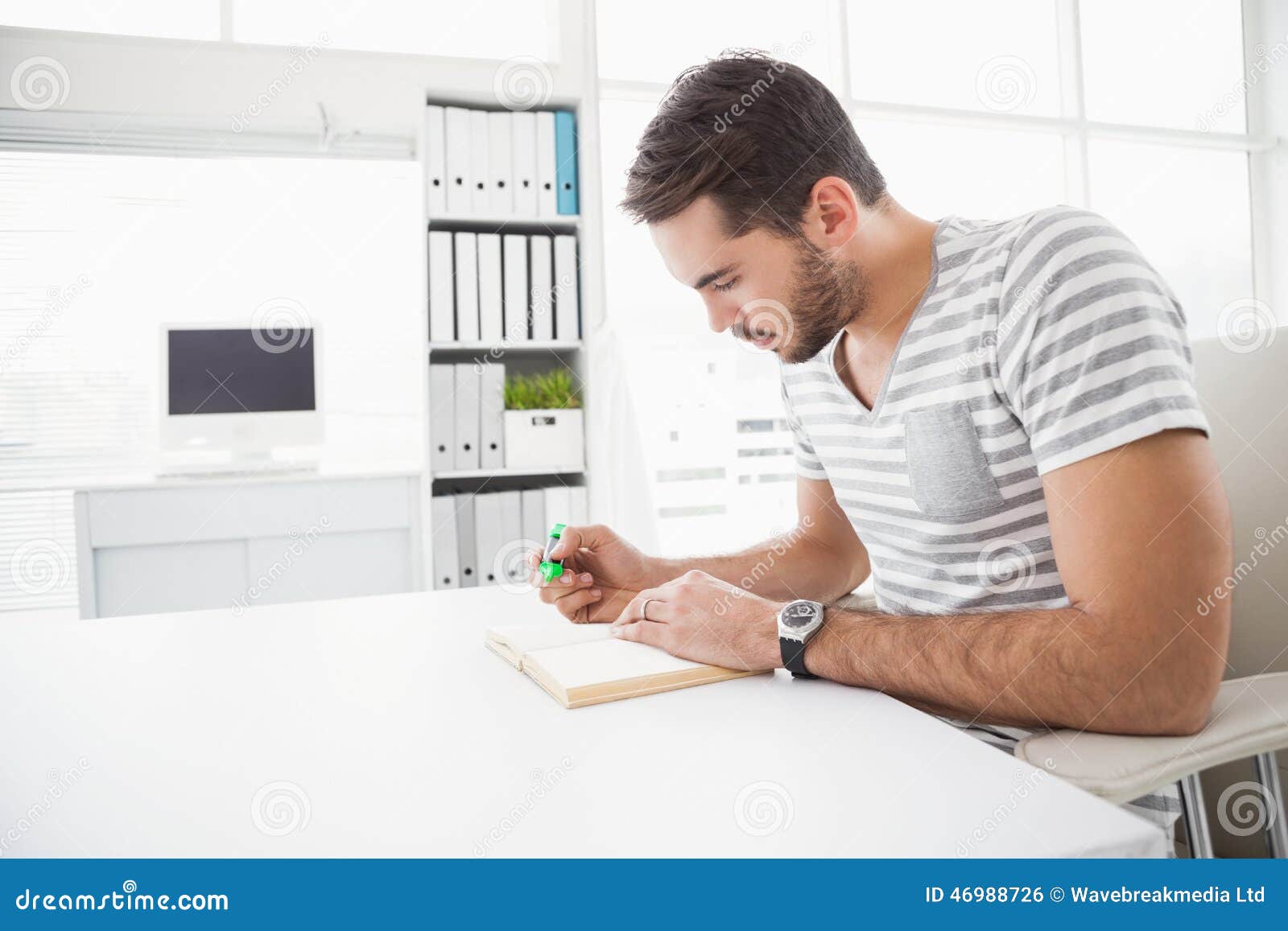 Casual Businessman Highlighting a Book Stock Photo - Image of ...