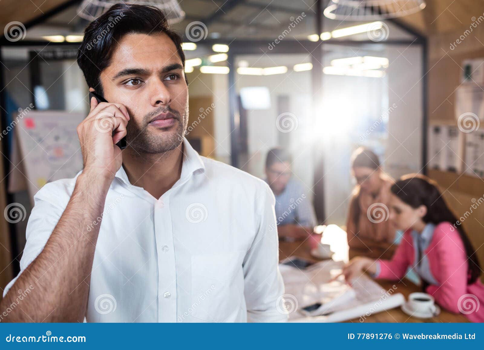 Casual Businessman Making a Phone Call Stock Photo - Image of graphic ...