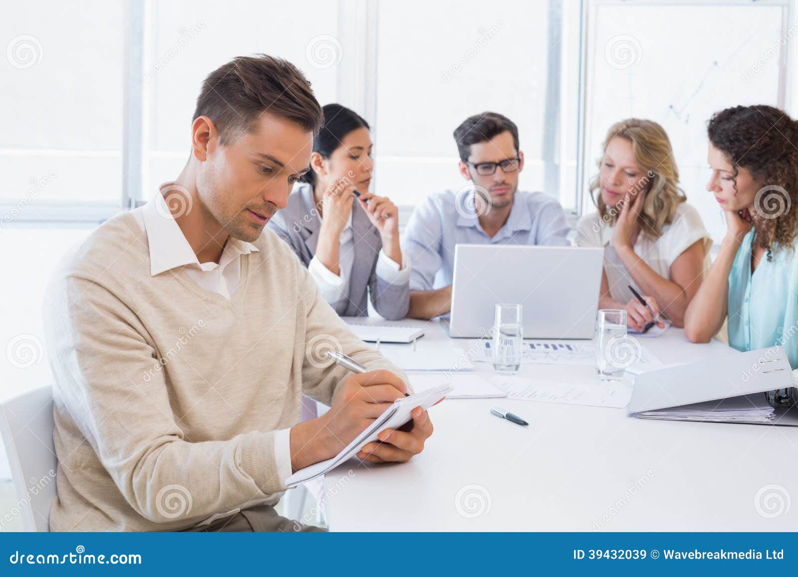 Casual Businessman Taking Notes during Meeting Stock Image - Image of ...