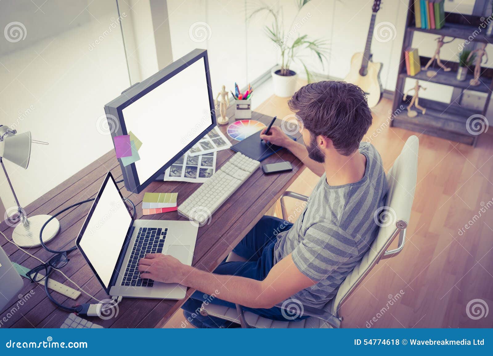 Casual Businessman Using Computers in Office Stock Photo - Image of ...
