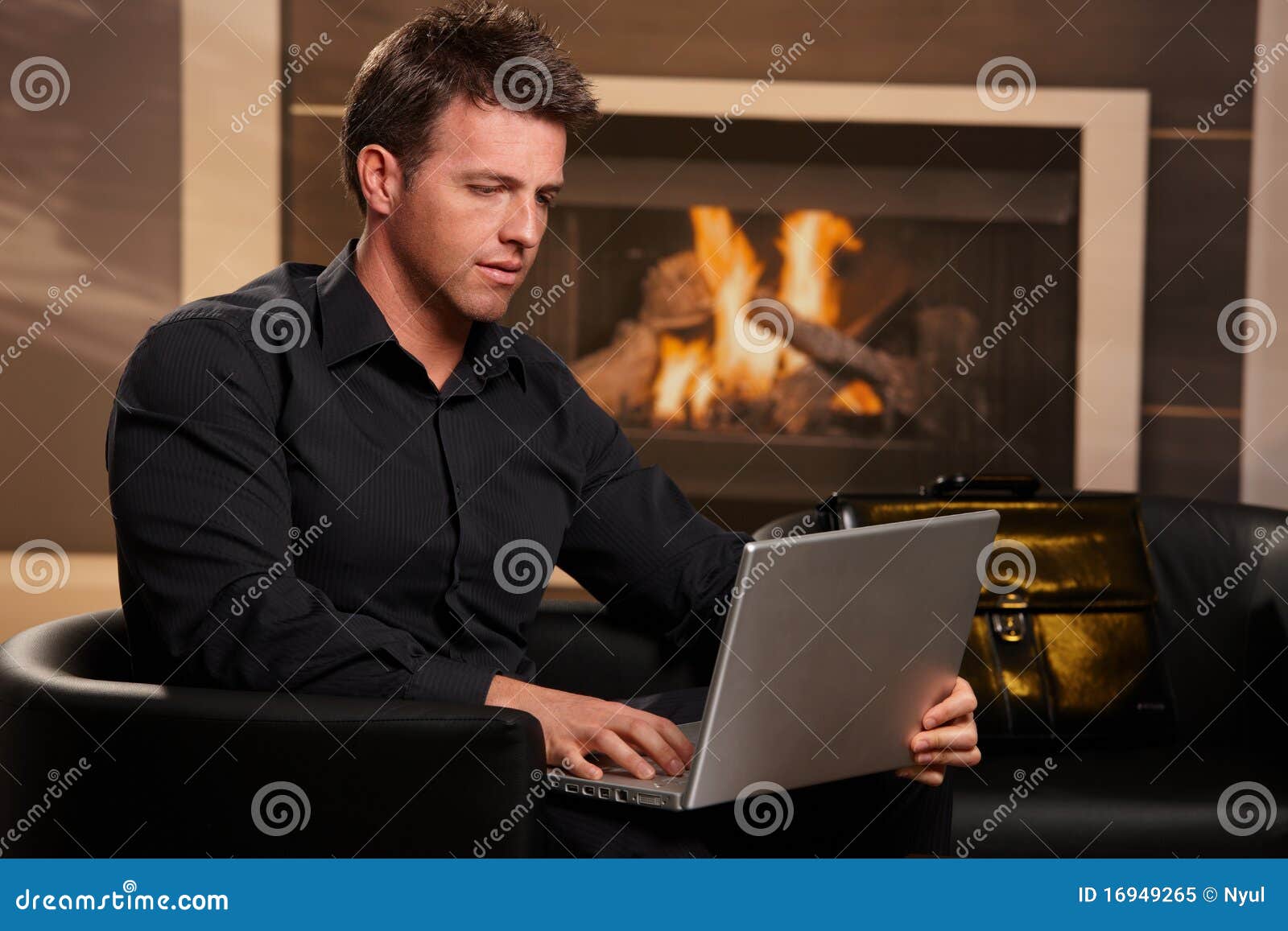 Casual Businessman Using Laptop at Home Stock Image - Image of ...