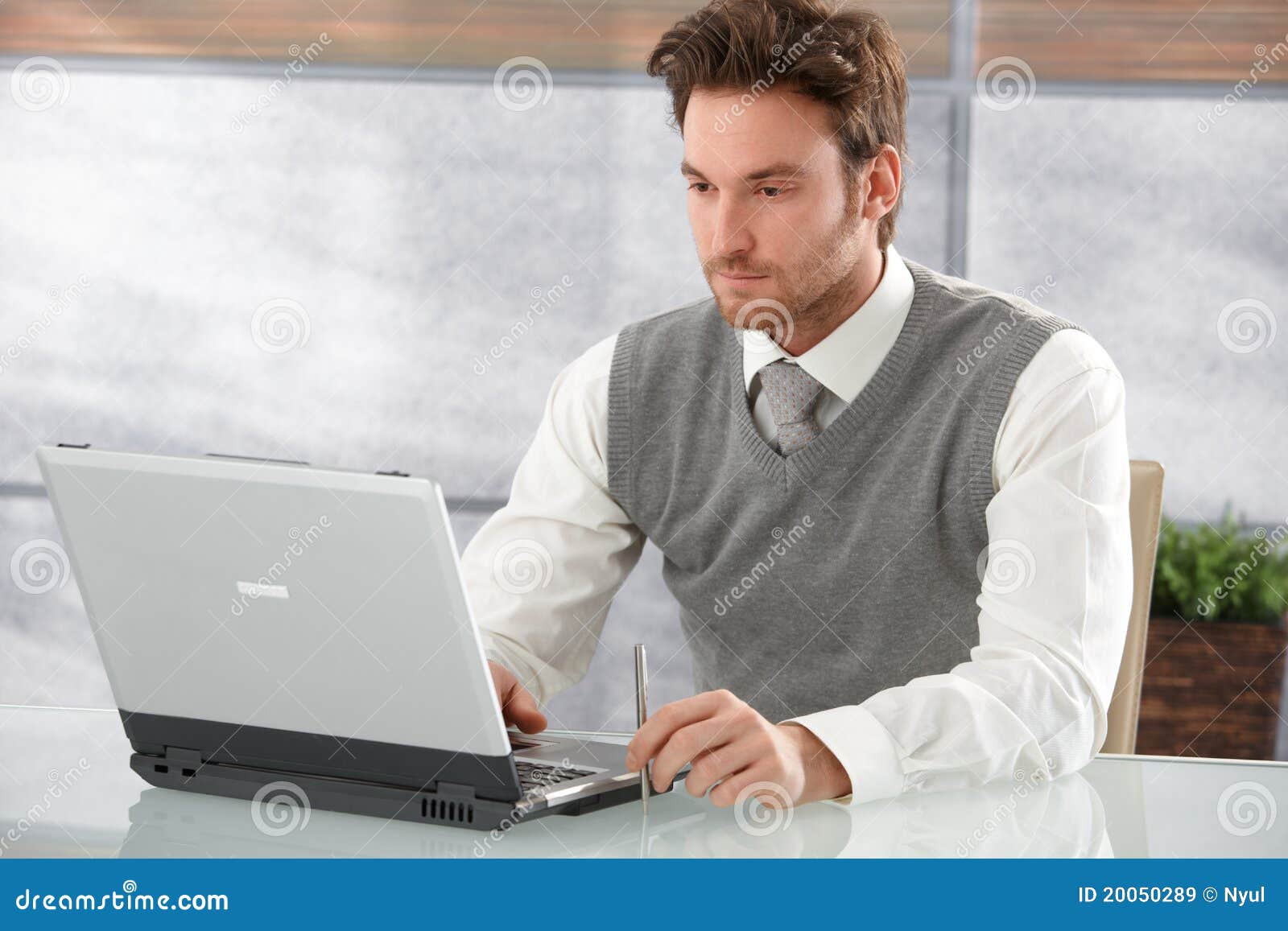 Casual Businessman Working on Laptop Stock Image - Image of handsome ...
