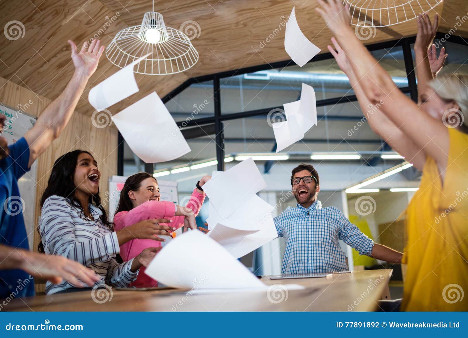 Casual Colleagues Throwing Paper Stock Photo - Image of female ...