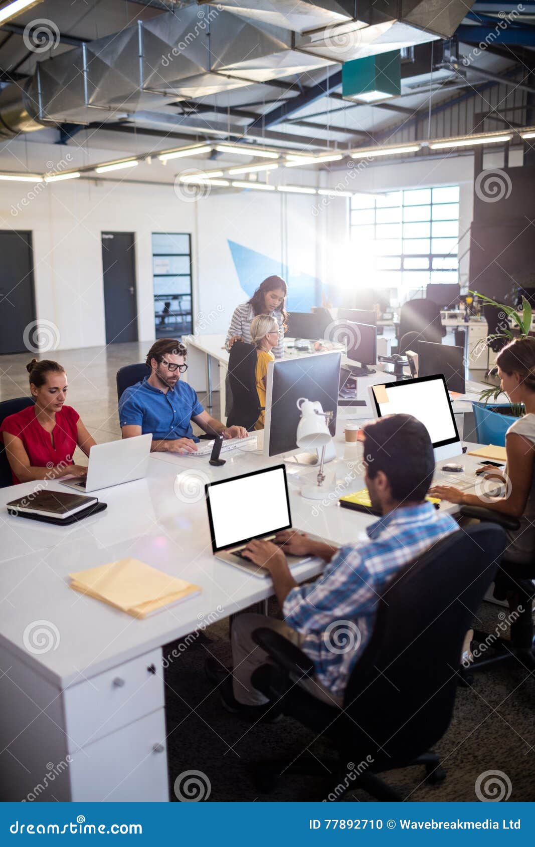 Casual Colleagues Using Technology Stock Photo - Image of clothing ...