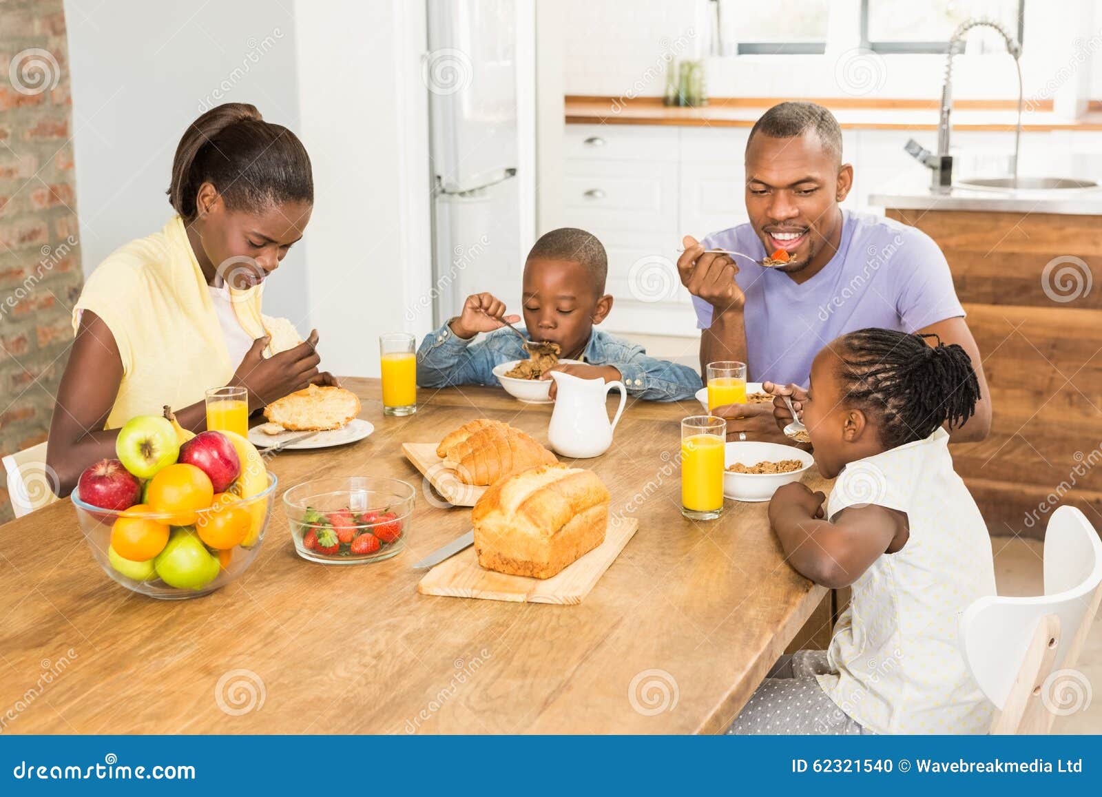 Casual Happy Family Having Breakfast Stock Photo - Image of father ...