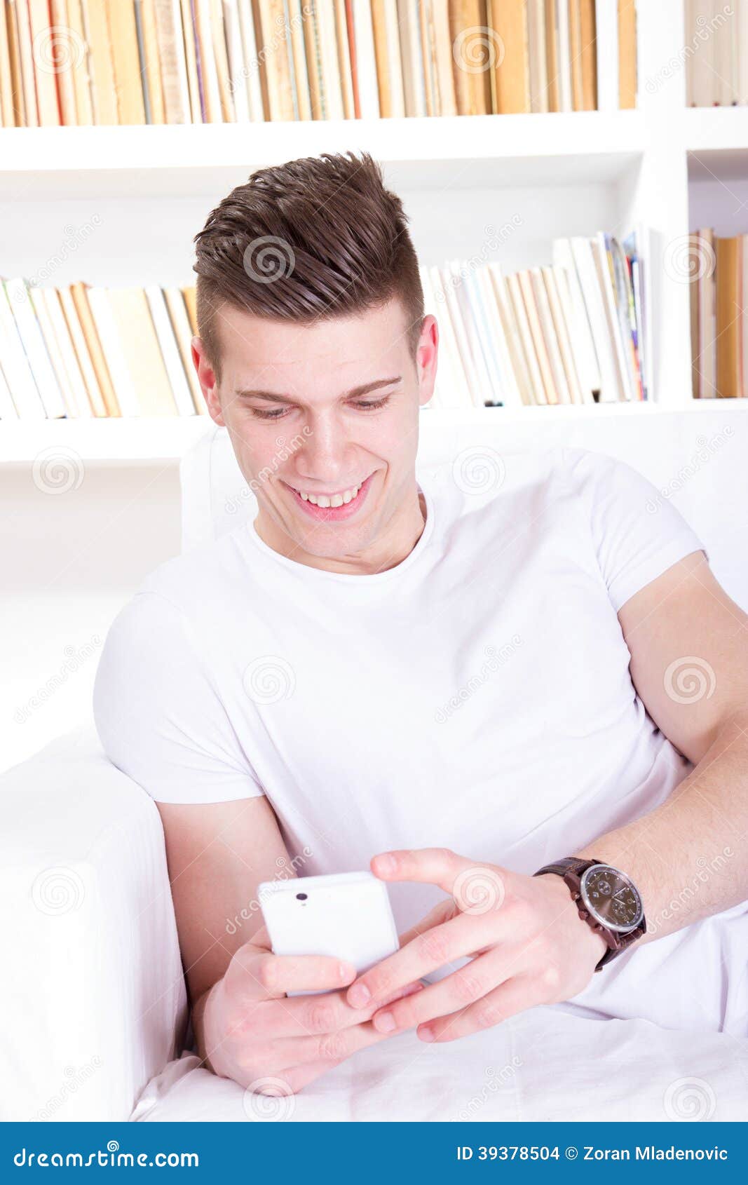 Casual Happy Young Man Sending Message on Mobile Phone Stock Photo ... Casual Happy Young Man Sending Message on Mobile Phone Stock Photo ...