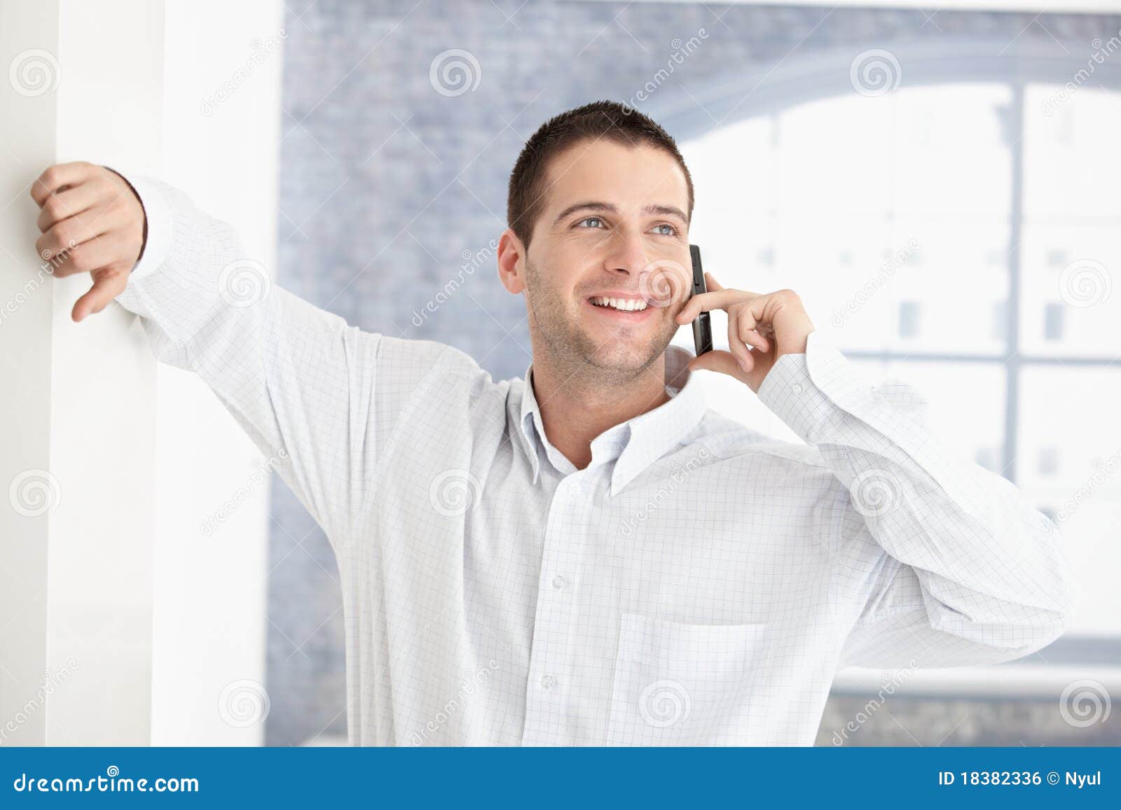 Casual Man Chatting on Mobile Smiling Stock Photo - Image of happiness ...