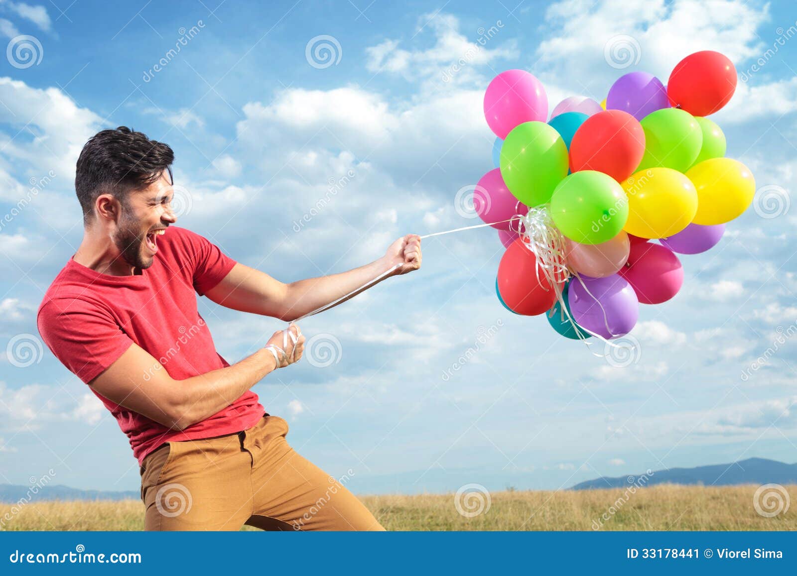 Casual Man with Colorful Balloons Stock Image - Image of caucasian ...