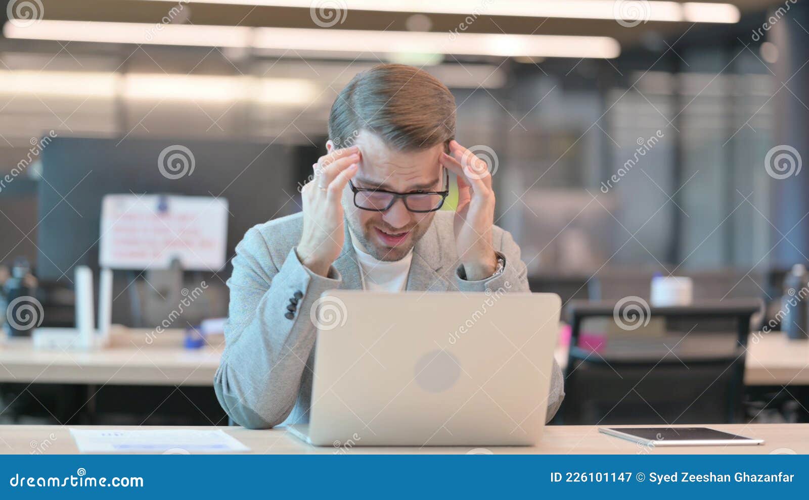Young Man with Laptop Having Headache Stock Image - Image of desk ...