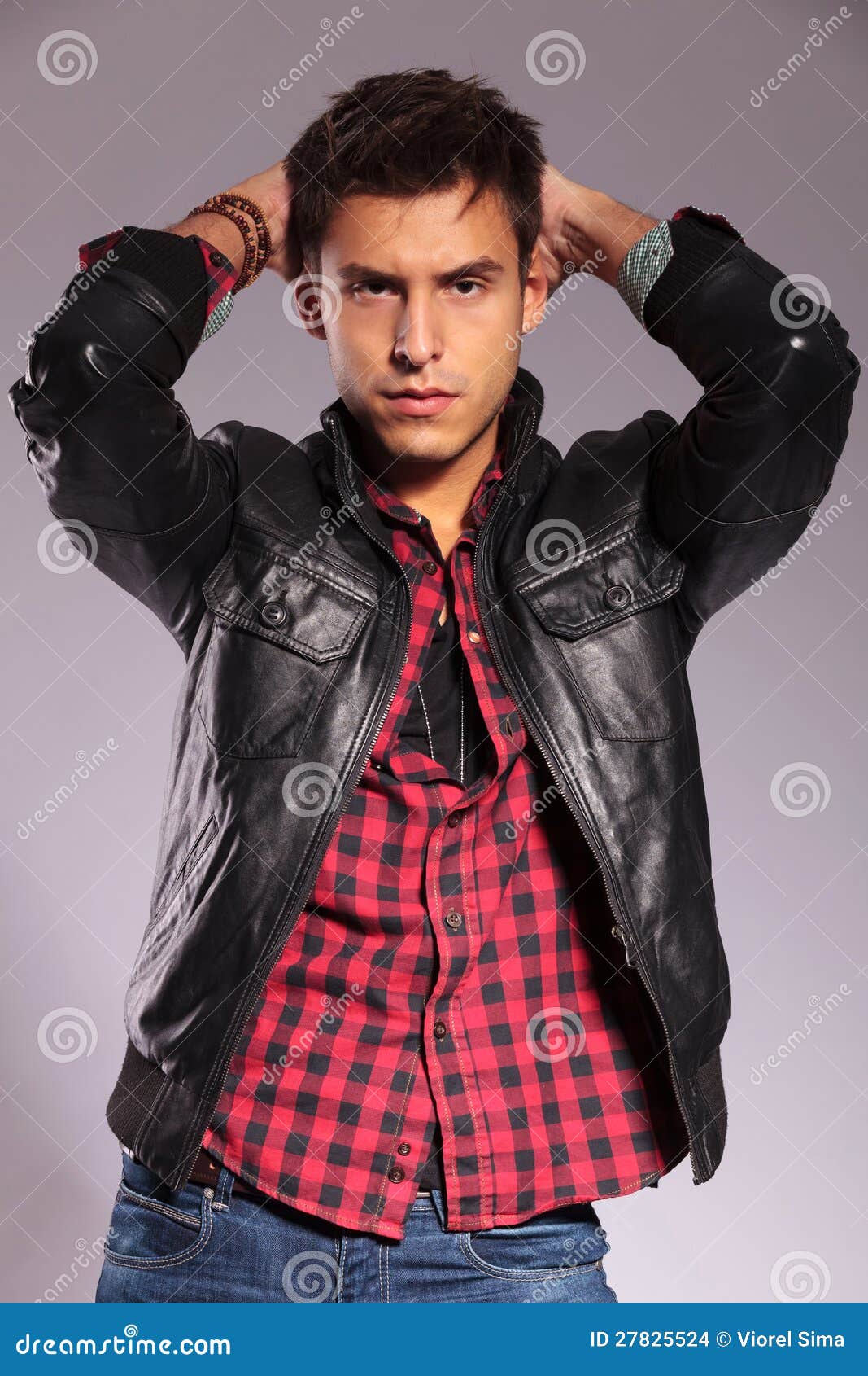 Casual Man in Leather Jacket in a Fashion Pose Stock Photo - Image of ...