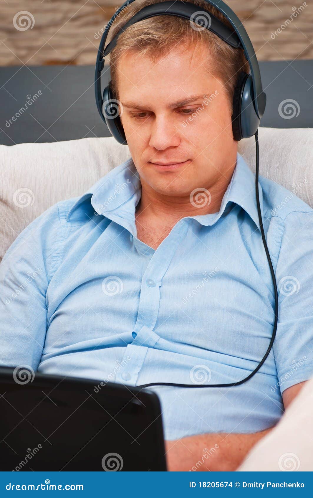 Casual man listening music stock photo. Image of chatting - 18205674
