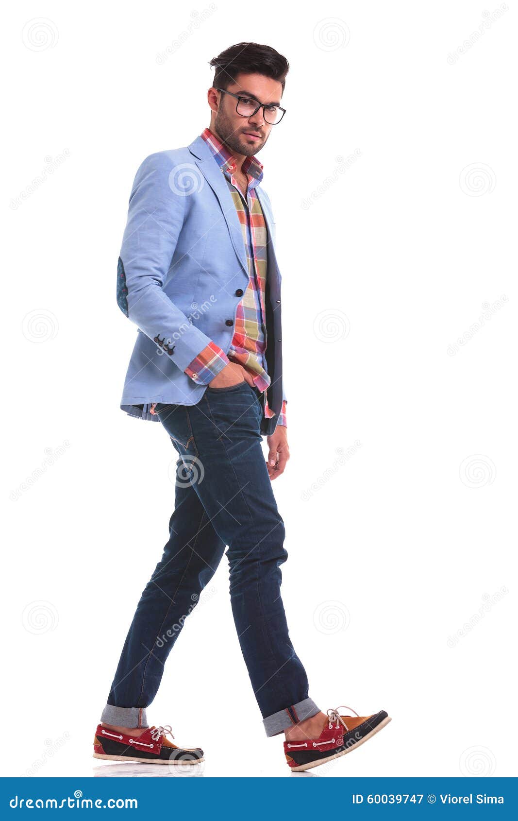 Casual Man Looking at the Camera while Walking Stock Image - Image of ...