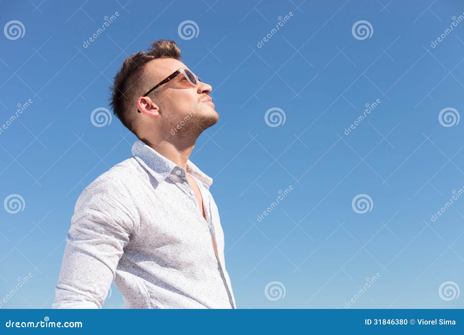 Casual Man Looking at the Sun Stock Photo - Image of clear, light: 31846380