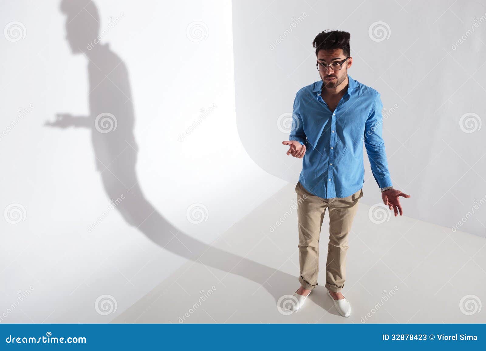 Casual Man Looking Up Questioningly Stock Image - Image of caucasian ...
