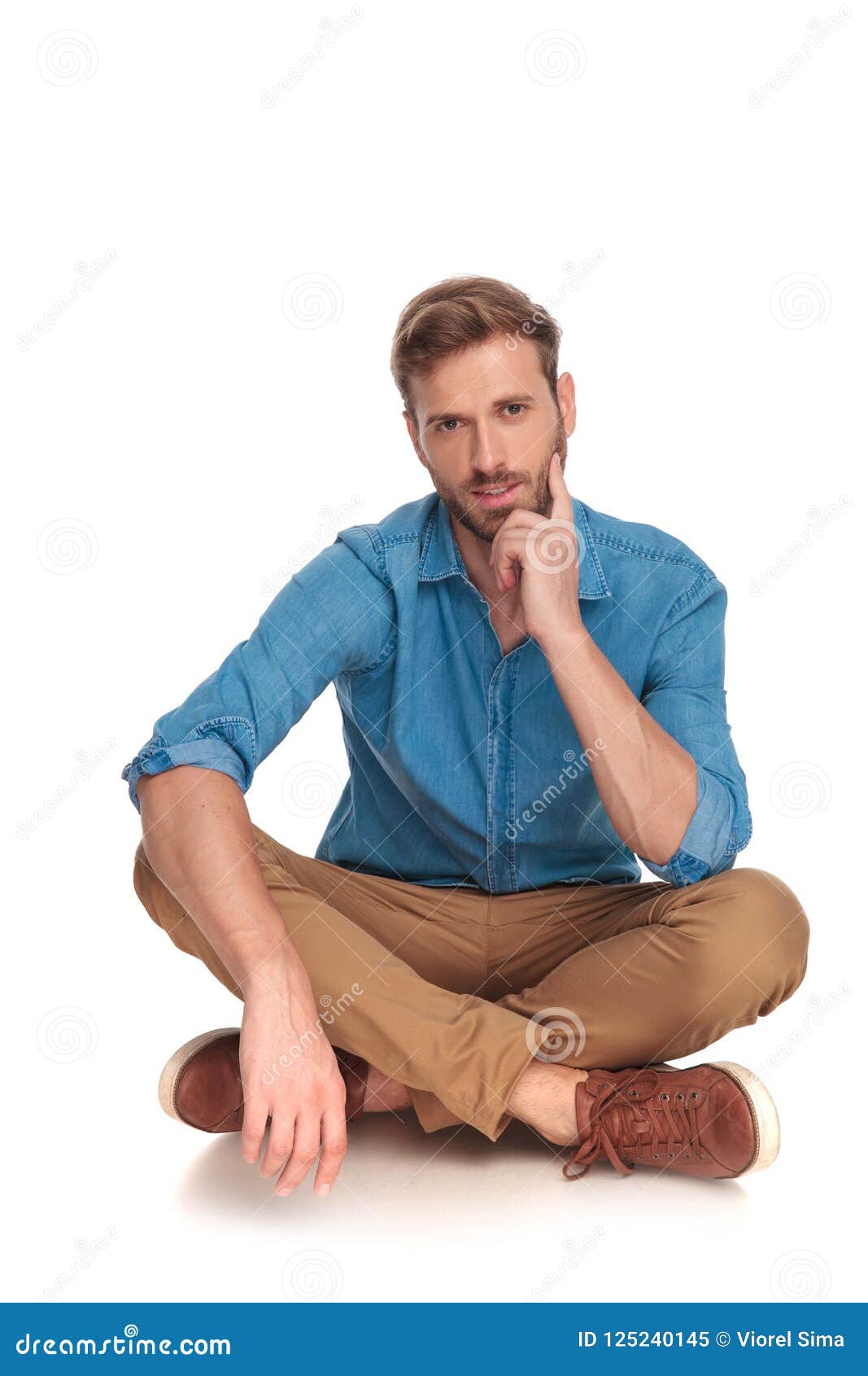 Casual Man Lying Down and Thinking Stock Image - Image of knee, legs ...