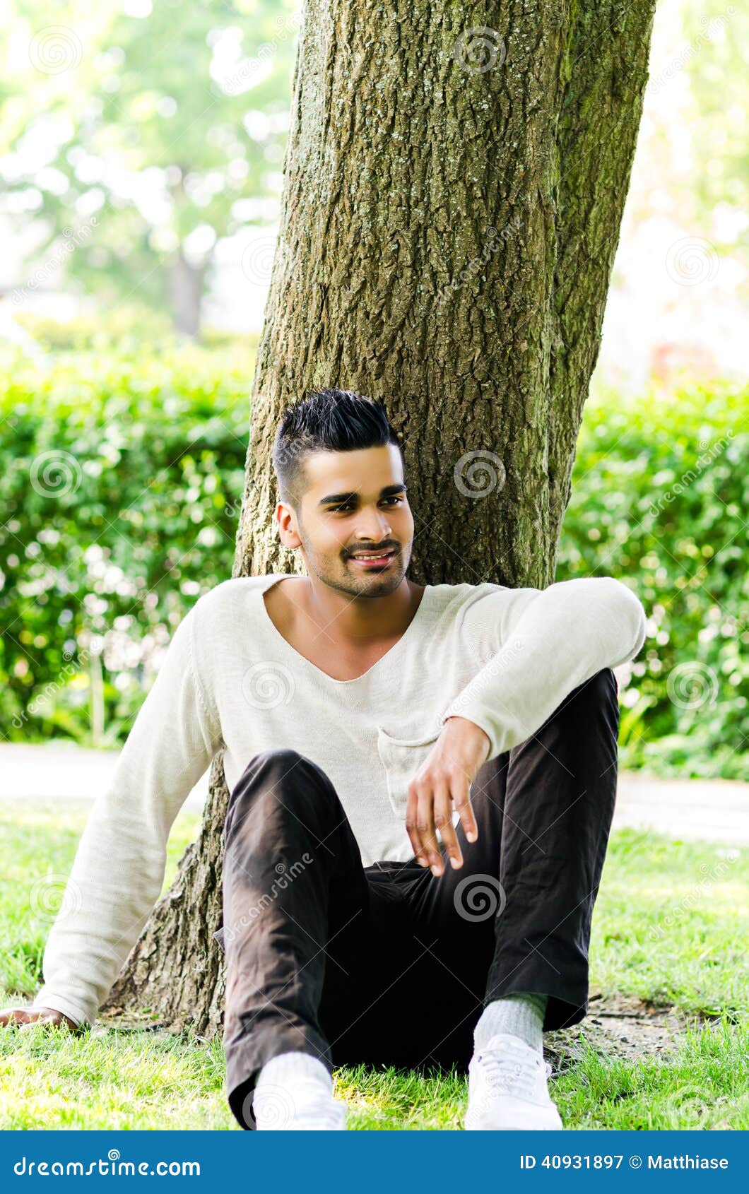 Casual Man Sitting Under a Tree Stock Image - Image of park, asian ...