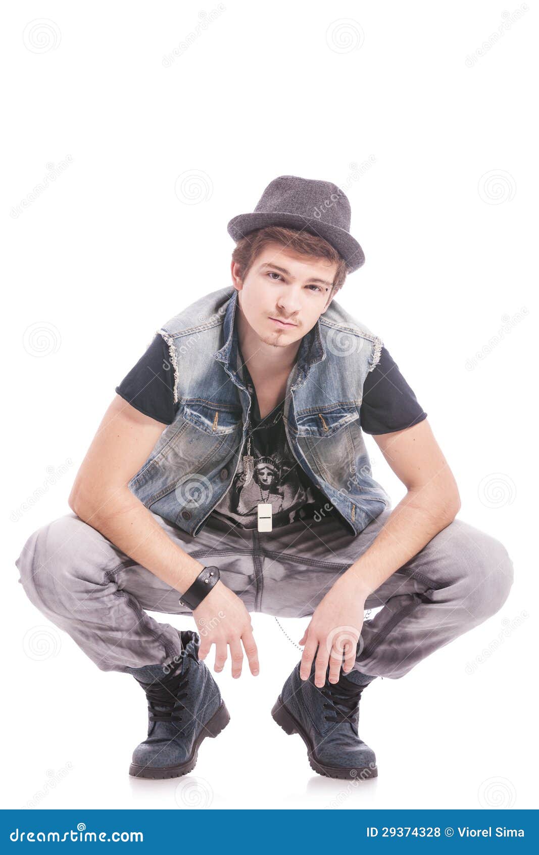 Casual man sits crouched stock photo. Image of jazz, fashion - 29374328
