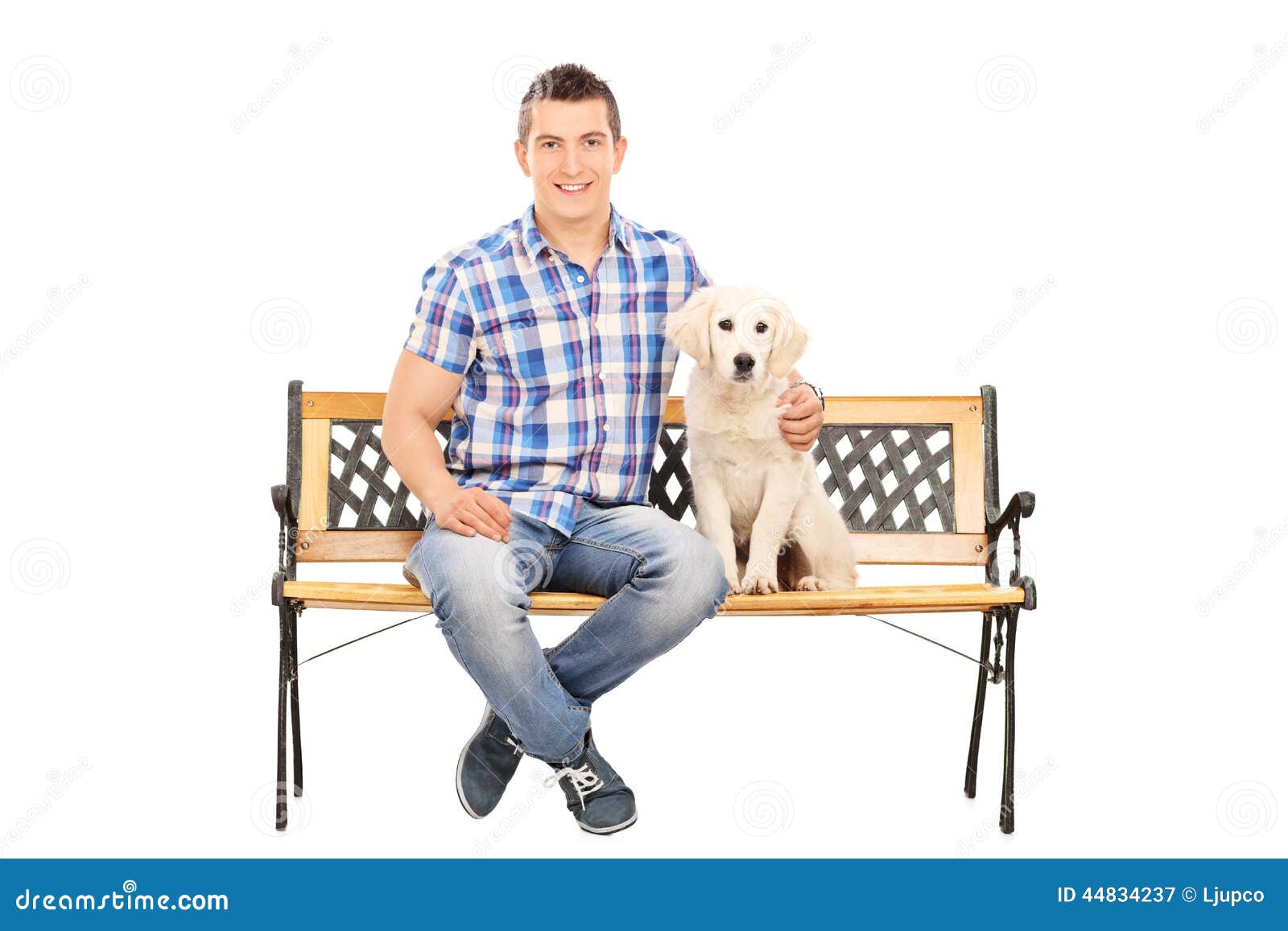 Casual Man Sitting on a Bench with a Puppy Stock Image - Image of ...