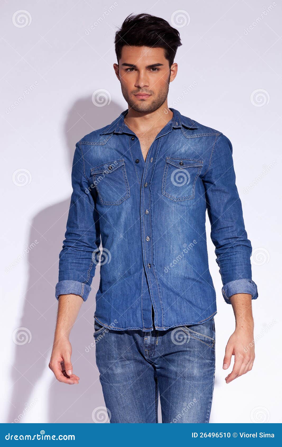 Casual Man Standing on Grey Background Stock Photo - Image of jeans ...