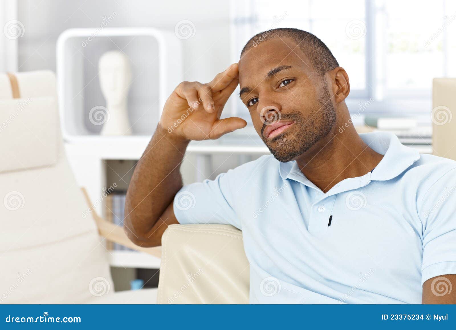 Casual Man Thinking in Living Room Stock Photo - Image of indoor ...