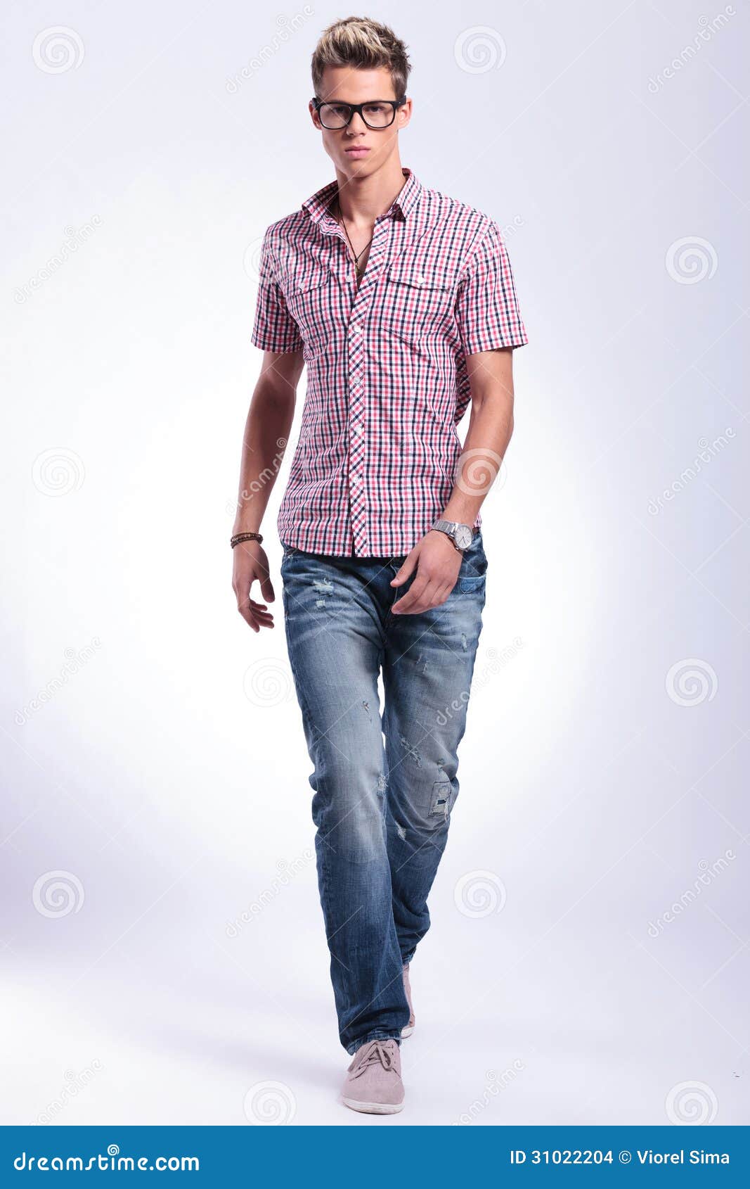 Casual man walks forward stock photo. Image of student - 31022204
