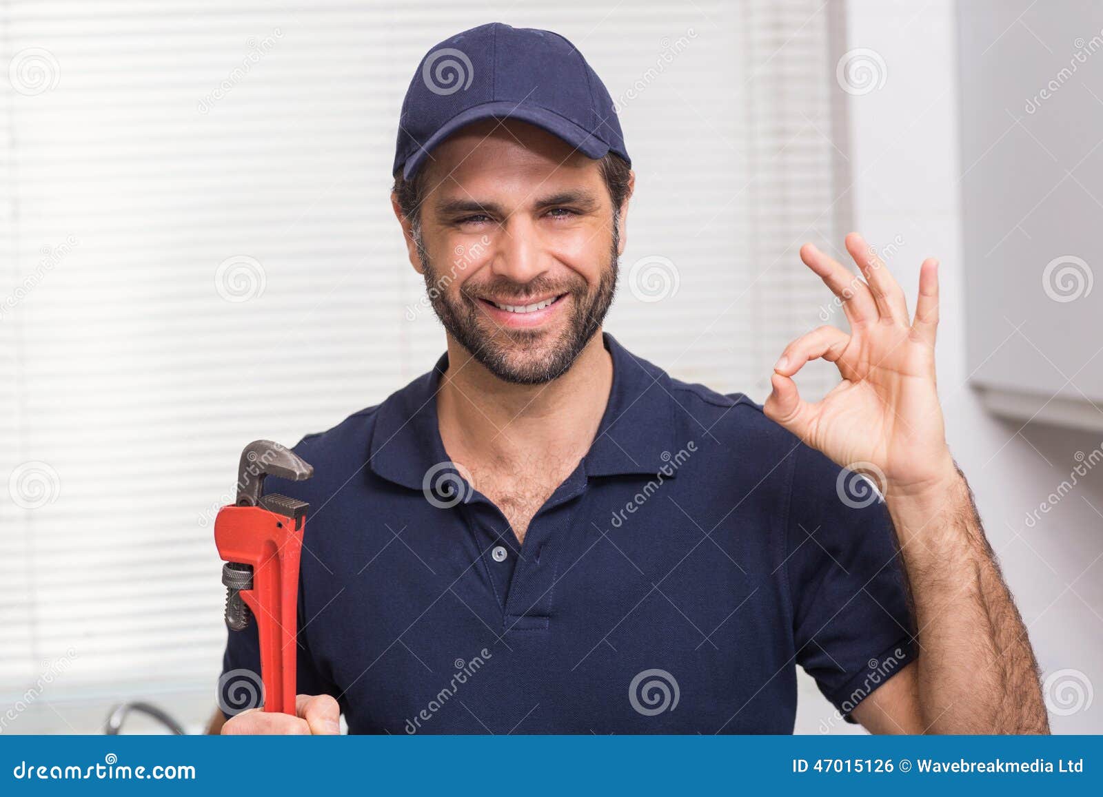 Casual Plumber Smiling at Camera Stock Photo - Image of handsome ...