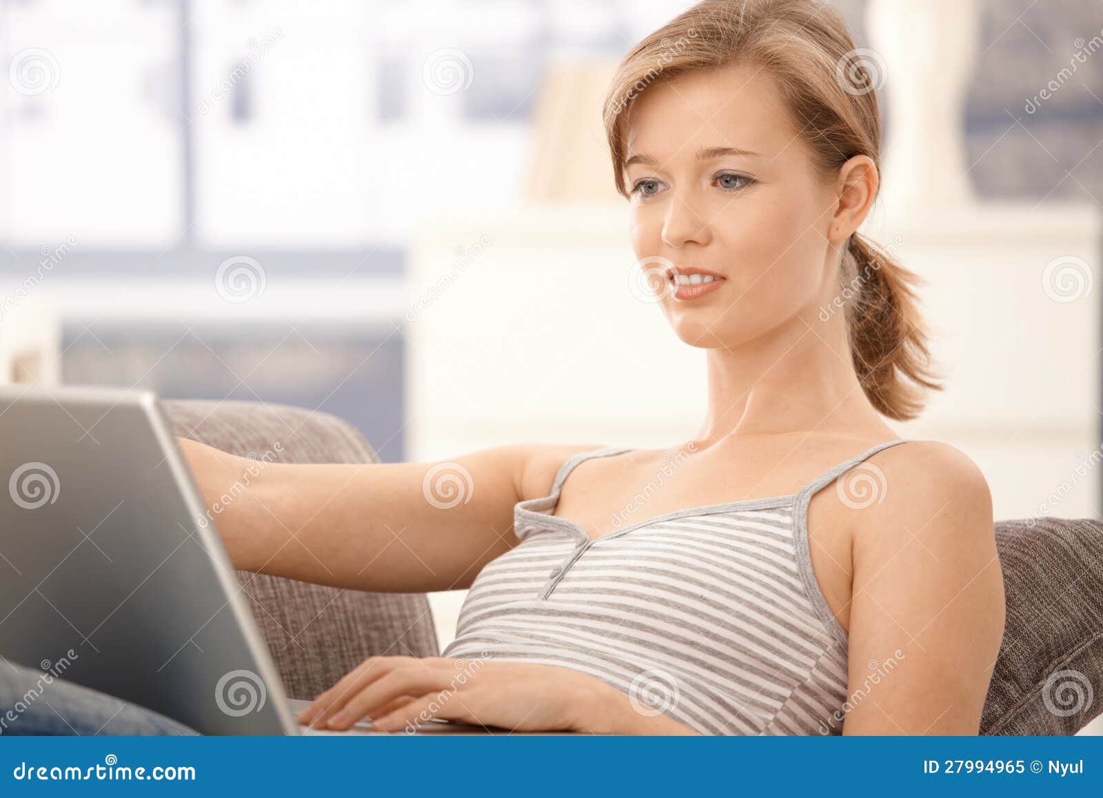 Casual Woman Browsing Internet at Home Stock Image - Image of brunette ...