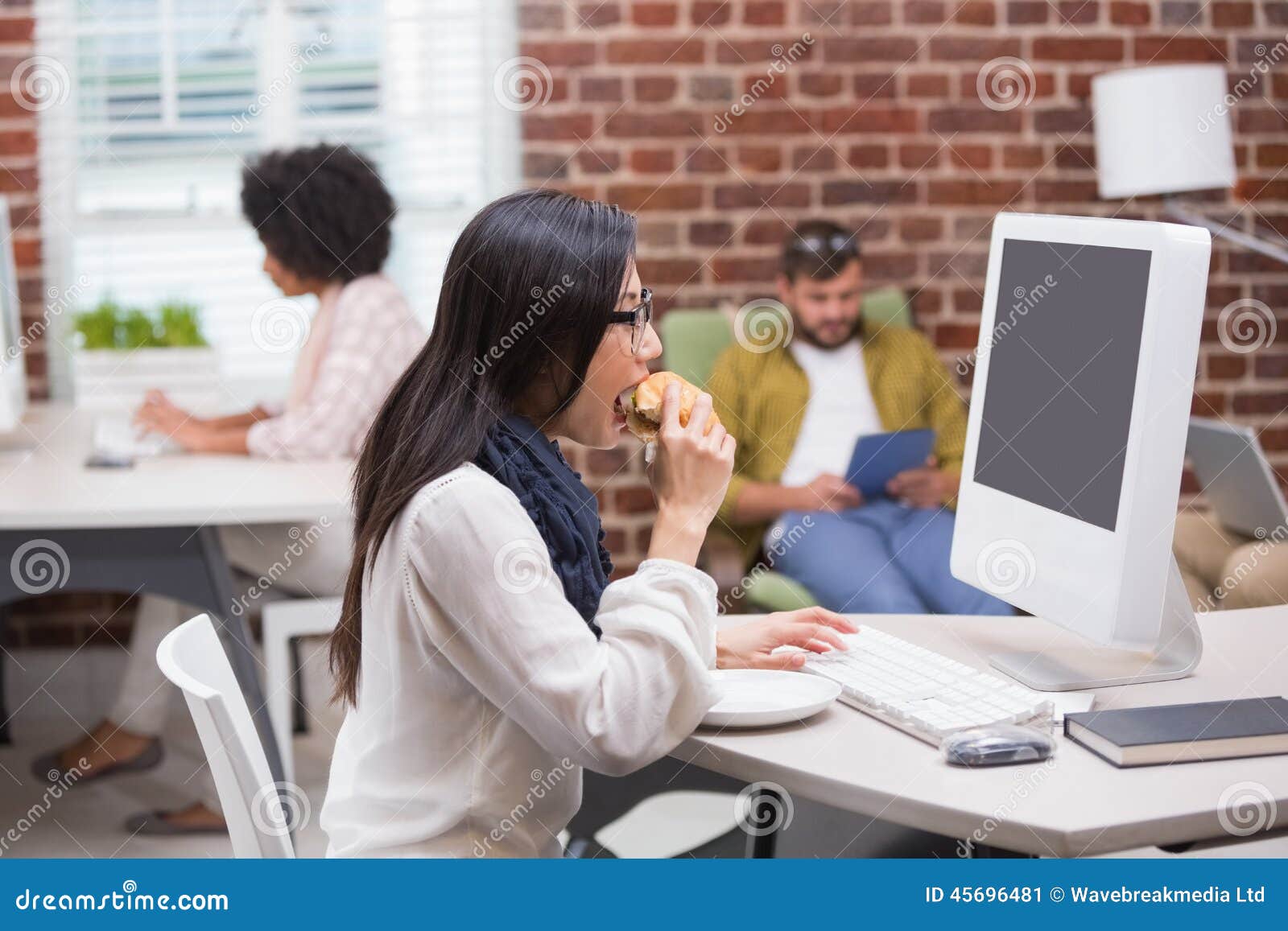 Casual Woman Drinking Coffee while Using Computer Stock Image - Image ...