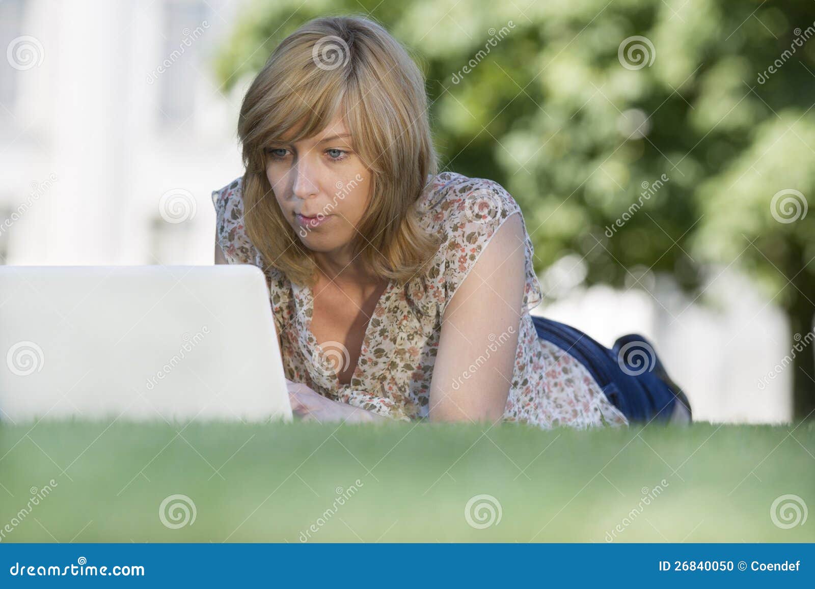 Casual Woman Using Laptop Outdoors Stock Photo - Image of concentration ...