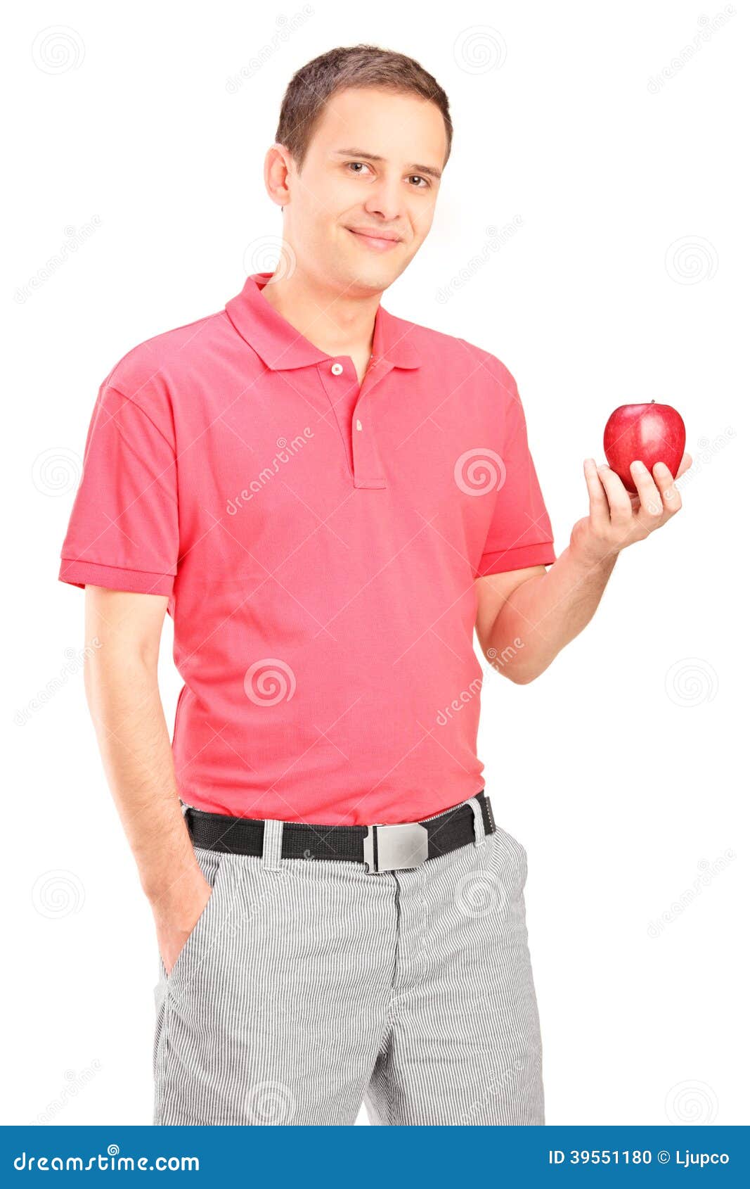 Casual Young Man Holding an Apple Stock Photo - Image of casual, posing ...