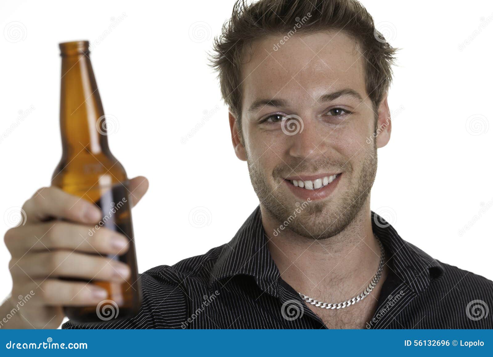 Casual Young Man Holding Bottle of Beer, Smiling Stock Photo - Image of ... Casual Young Man Holding Bottle of Beer, Smiling Stock Photo - Image of ...