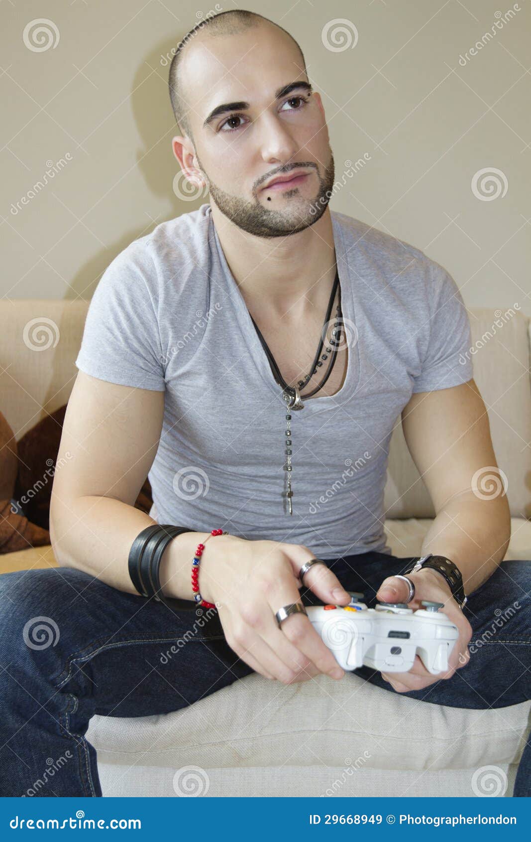 Casual Young Man Playing Video Game Stock Image - Image of sitting ...