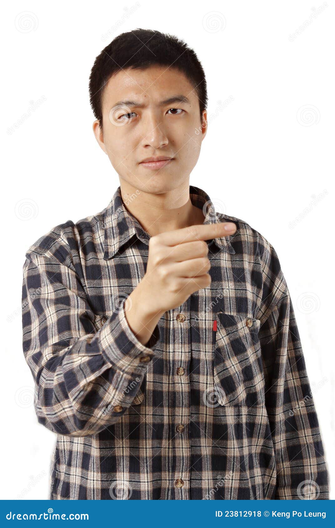 Casual Young Man Pointing Left Stock Photo - Image of 2530, goodlooking ...