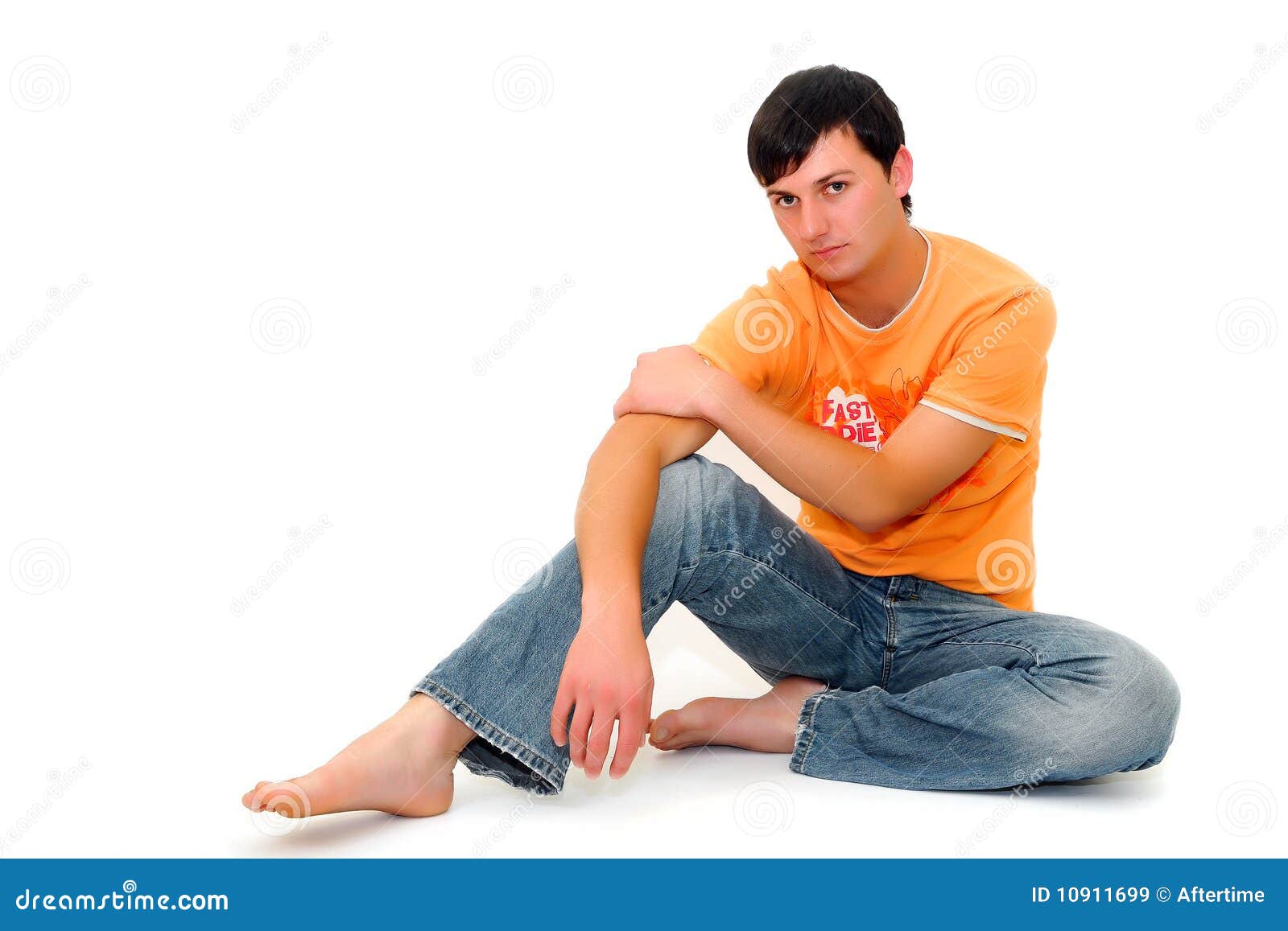 Casual Young Man Sitting on the Floor Stock Image - Image of sitting ...
