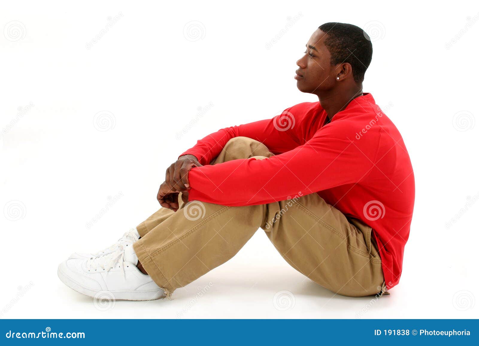 Casual Young Man Sitting on Floor Stock Photo - Image of model, watch ...