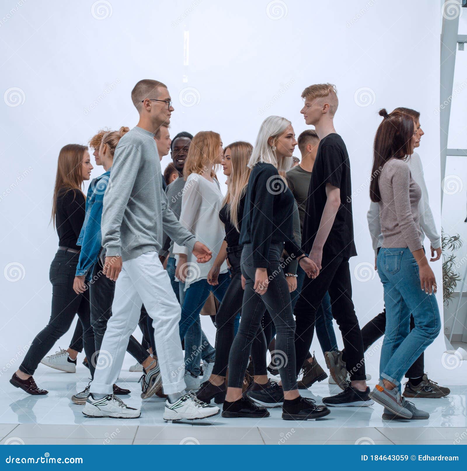 Casual Young People Walking in Different Directions Stock Image - Image ...