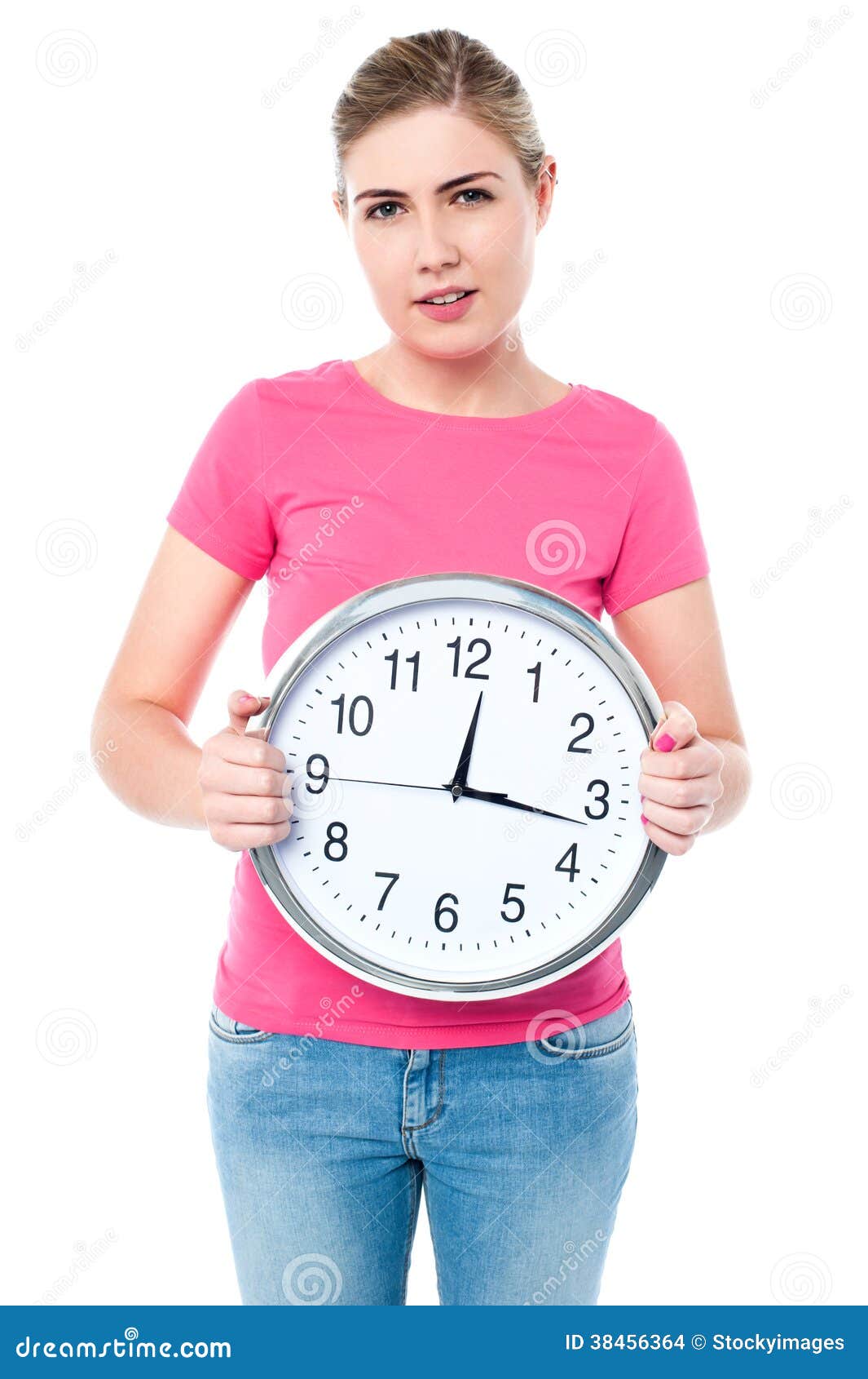 Casual Young Woman Holding a Clock Stock Photo - Image of indoors ...
