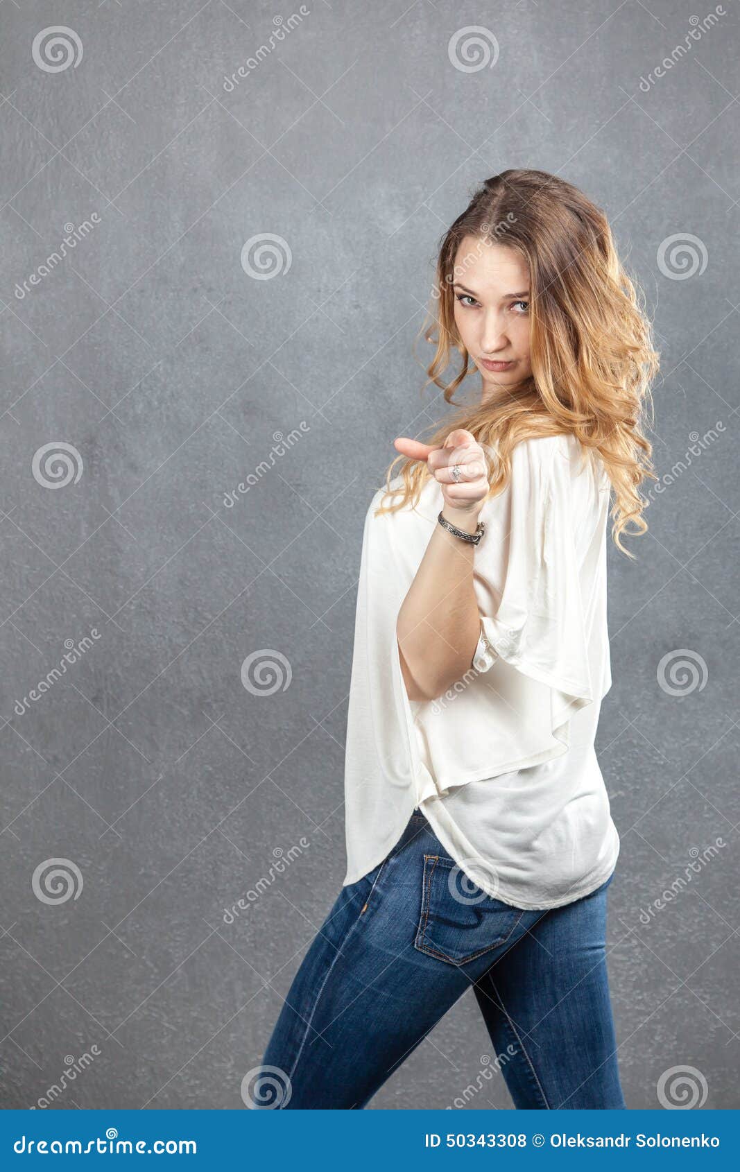 Casual Young Woman Pointing at Camera with Finger Stock Photo - Image ...