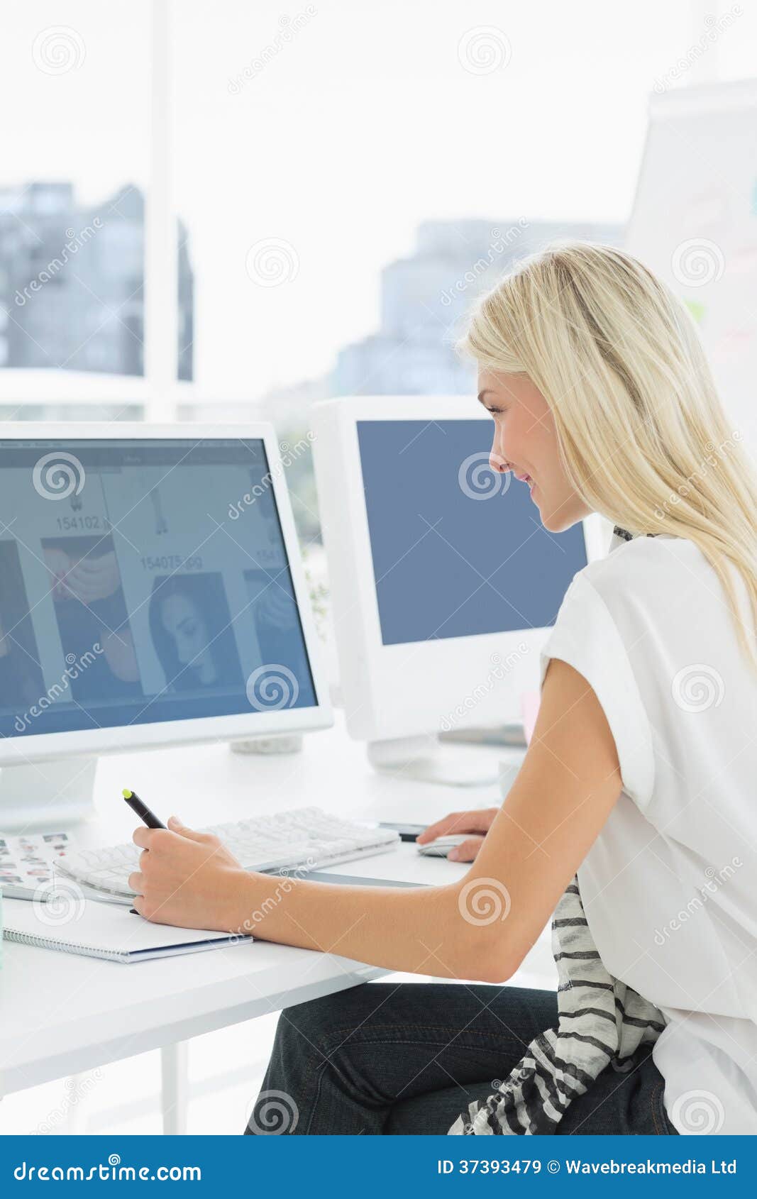Casual Young Woman Using Computer in Office Stock Image - Image of ...