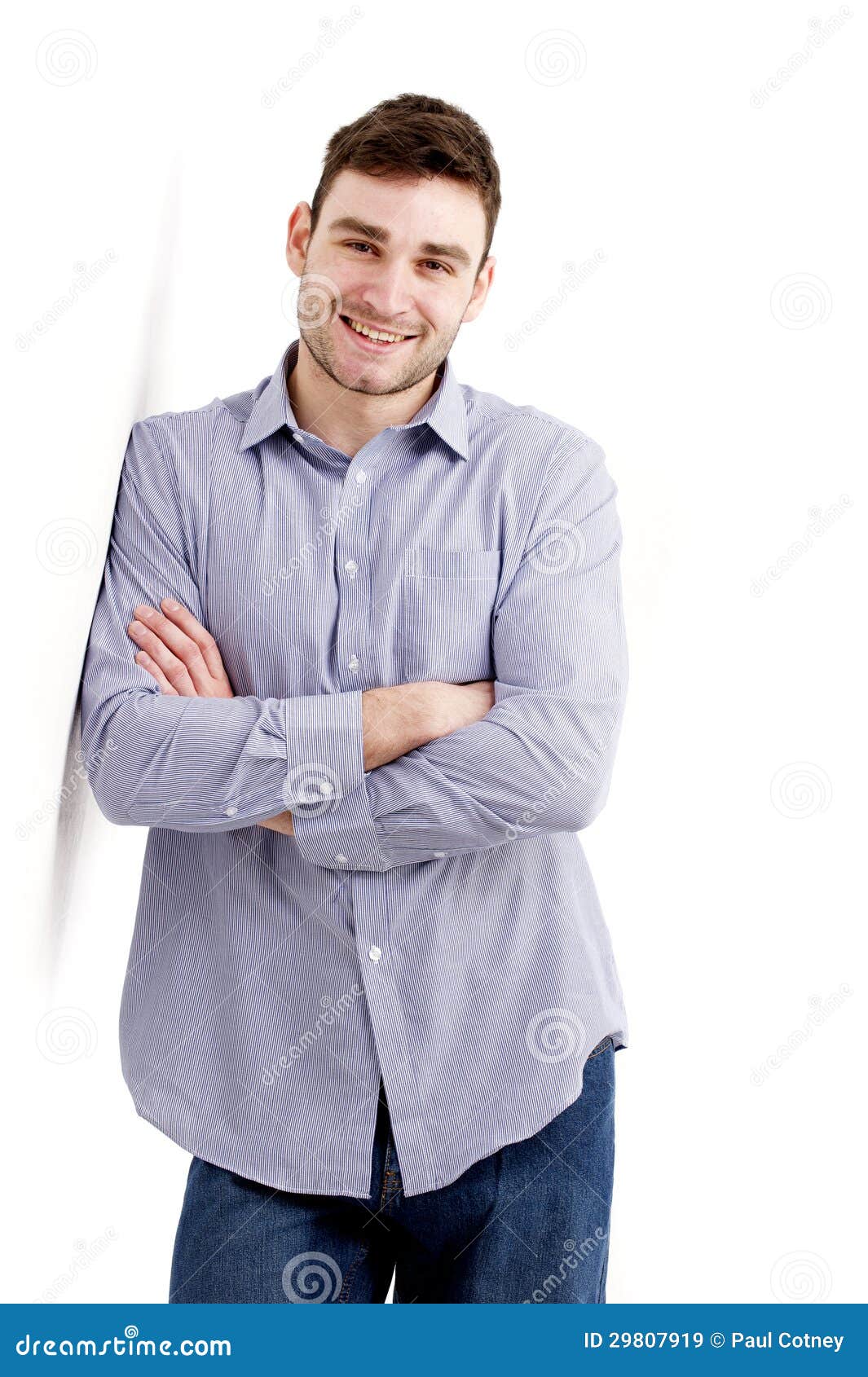 Handsome Man Leaning Against a White Wall Stock Image - Image of ...