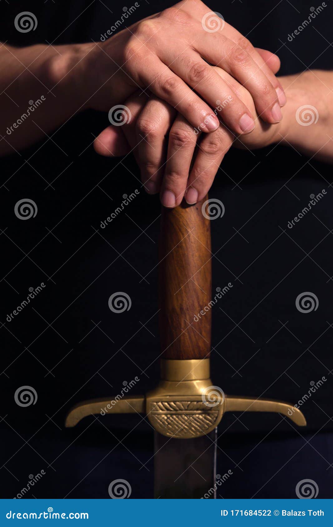 Young Athletic Man Holding His Sword Stock Photo - Image of integrity ...